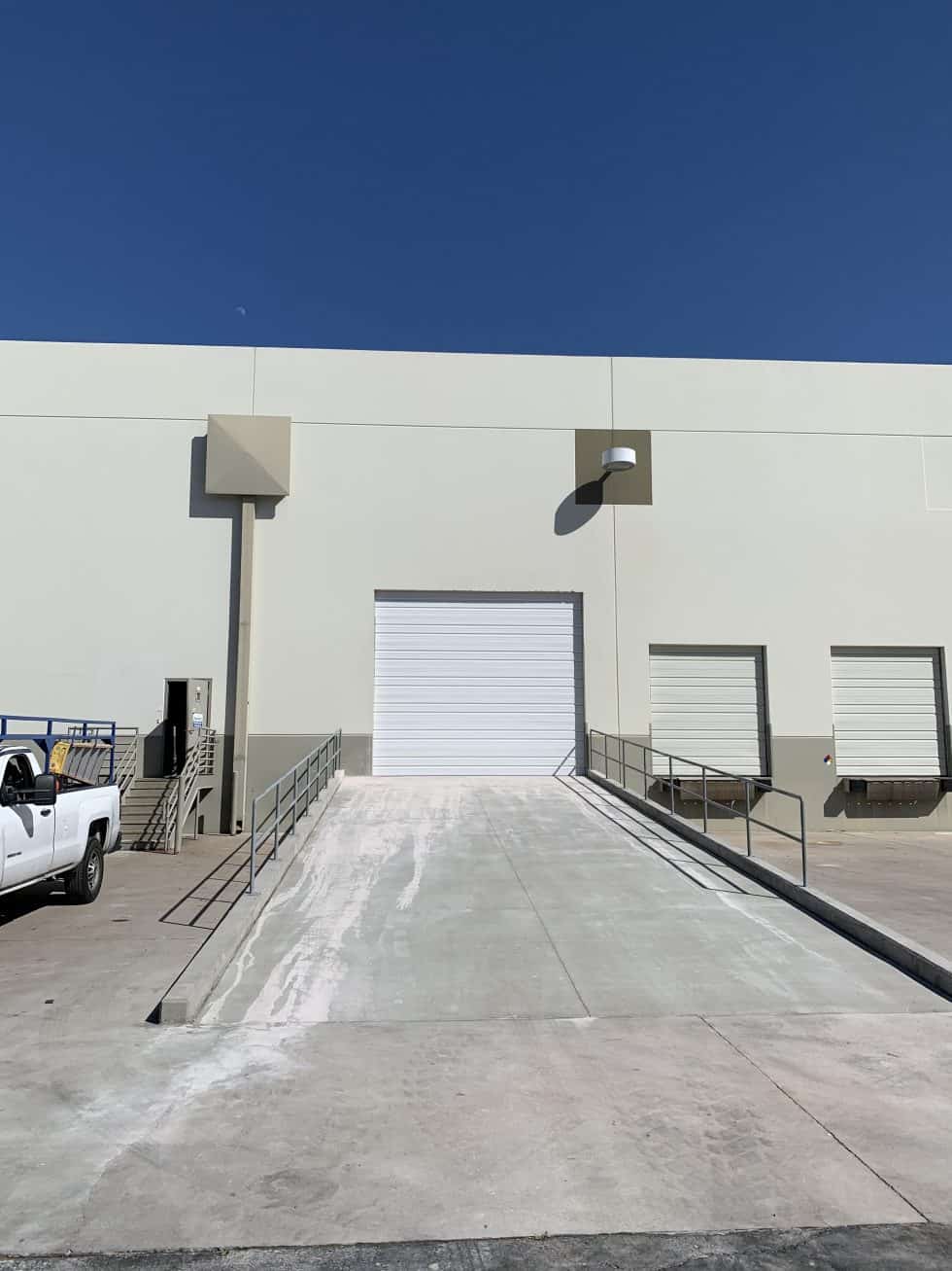 Tempe Warehouse Ramp & Garage Door Complete | Emerald Inc.
